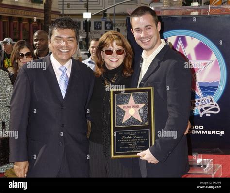 Actor Freddie Prinze Jr And His Mother Kathy Pose With Comedian