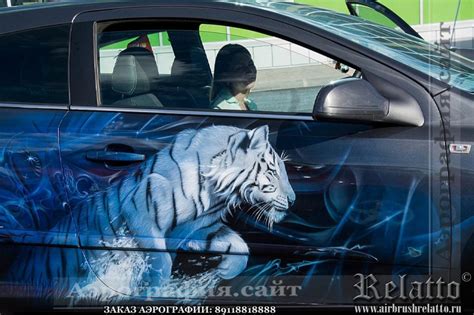 Аэрография автомобиля тигр на Opel Astra © Relatto