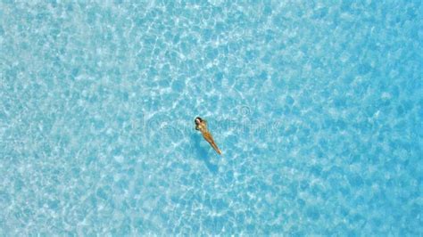 Woman Relaxing And Floating In Blue Ocean Aerial View Top View Stock Video Video Of Pool