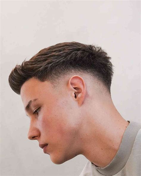 Mid Fade Haircut Comb Over Haircut Mens Haircuts Fade Sleek Hairstyles Latest Hairstyles