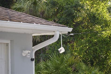 Motion Sensor With Light Detector Mounted On Exterior Wall Of Private House As Part Of Security