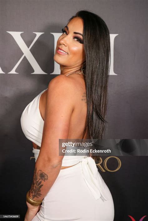 Courtney Tillia Attends The Maxim Carnival Mardi Gras Celebration At