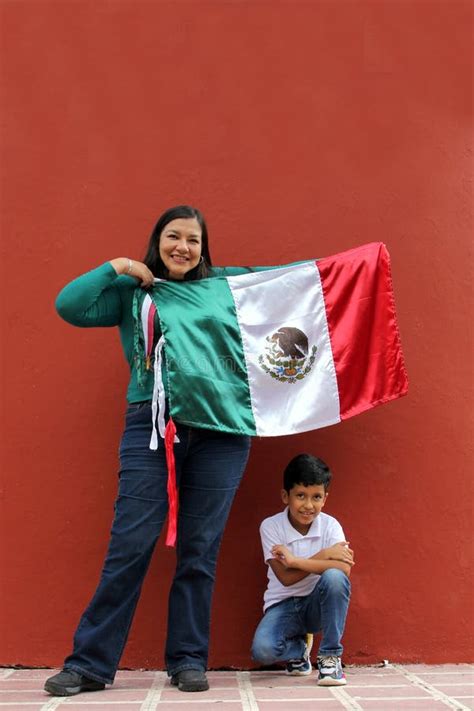 Latin Mexican Mom And Son Show The Flag Of Mexico Very Proud Of Their Culture And Tradition To