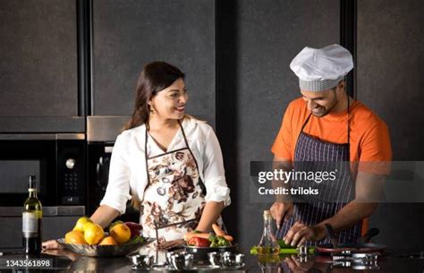 Indian Couple In Kitchen Photos And Premium High Res Pictures Getty