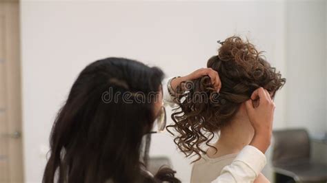 Side View Of Professional Makeup Artist Putting Powder Using Brush On