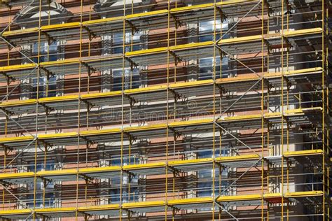 scaffolding on building facade construction framework stock image