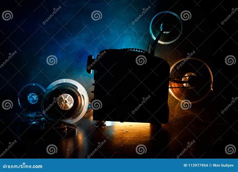 Old Style Movie Projector Close Up Film Projector On A Wooden