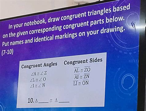 in your notebook draw congruent triangles based on the given