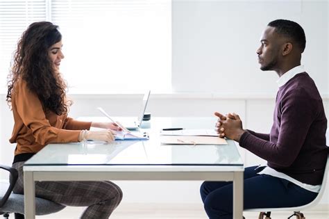 Premium Photo Female Manager Interviewing A Male Applicant