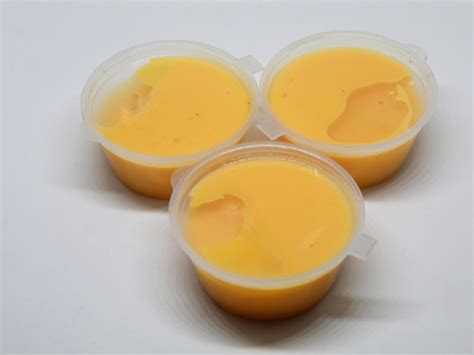 Premium Photo Cheese Spread In Small Containers