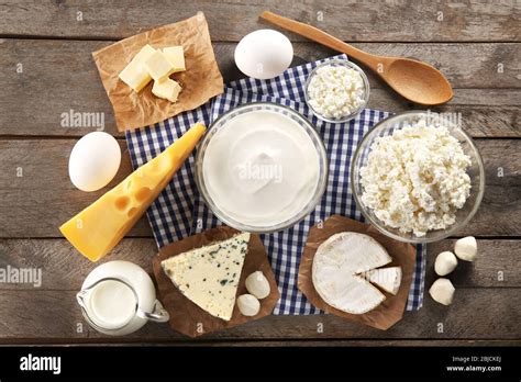 Different Types Of Dairy Products On Wooden Background Stock Photo Alamy