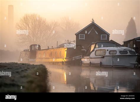Beautiful Foggy Misty Canal Narrow Boat Sunrise With Smoke From Chimney