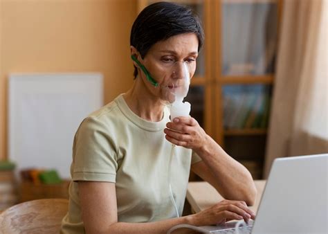 Free Photo Side View Woman Using Nebulizer