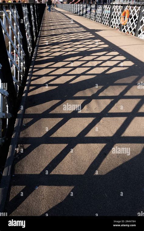 Abstract Lattice Pattern Shadow Of Pedestrian Bridge Balustrade On