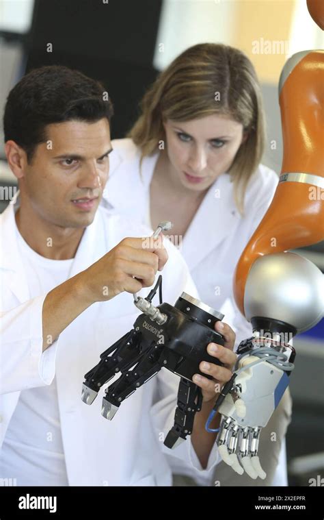 Humanoid Robot For Automotive Assembly Tasks In Collaboration With People And And Lwr Robot