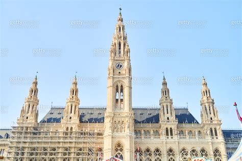 Viennas City Hall Tower Stands Majestically Against A Clear Sky