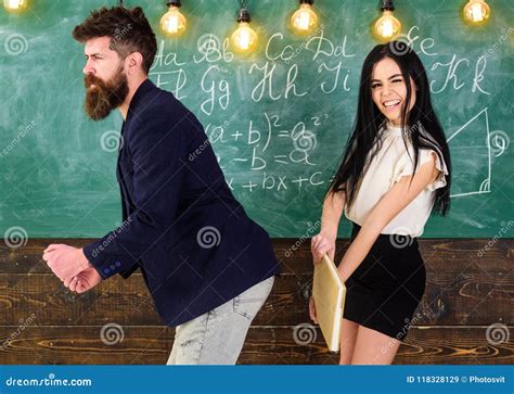 Student Lady Slapping On Teachers Buttocks With Book Girl On Smiling