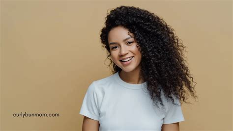 How To Tame Frizzy Curly Hair 17 Easy Tips To Reduce Frizz From A Curly Girl Curly Bun Mom