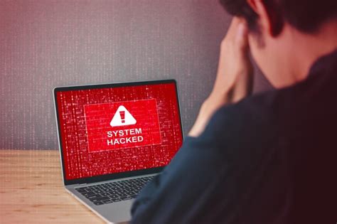 premium photo stressed businessman with laptop show system hacked