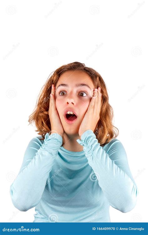 Cute Young Girl Is Looking Surprised And Funny Teenager Puts Hands To