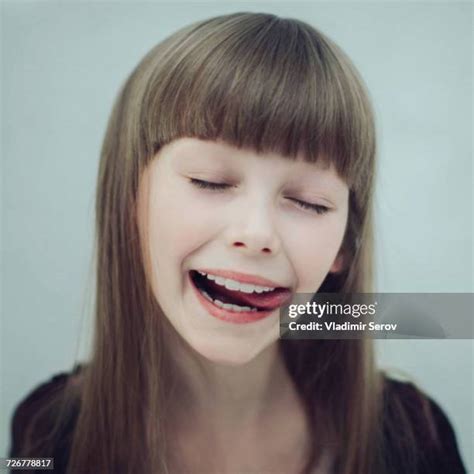 Girls Licking Lips Photos And Premium High Res Pictures Getty Images