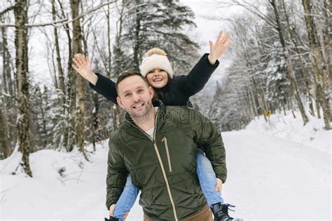 Handsome Dad And His Daughter Are Having Fun Outdoor In Winter Stock