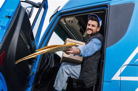 Handsome Delivery Guy Getting His Deliveries Ready Stock Image Image