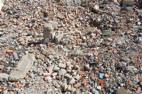 Pile Of Bricks And Fragments Of Concrete From Destroyed Building Stock