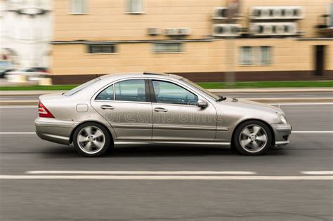 Mercedes Benz C Class W203 Driving On The Street On High Speed Beige