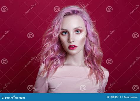 Portrait Of A Woman With Bright Colored Flying Hair All Shades Of Pink Purple Hair Coloring
