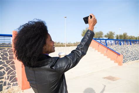 Young And Beautiful Afro American Woman Is Happy Smiling Taking Selfie