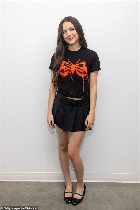 Olivia Rodrigo Bares Her Toned Midriff In A Cropped Sweater On A Visit