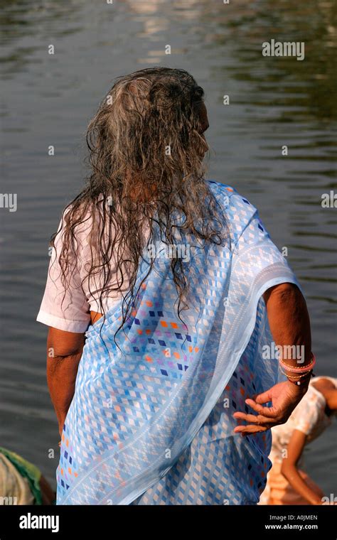 Rajasthani Woman At The Bathing Ghat On Lake Pichola Udaipur