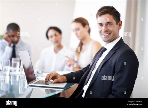 Hes Always Connected And Available Portrait Of A Happy Businessman
