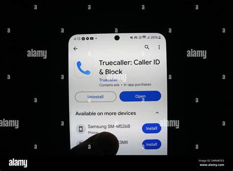 Non Exclusive A Man Using Truecaller App On His Mobile Truecaller On