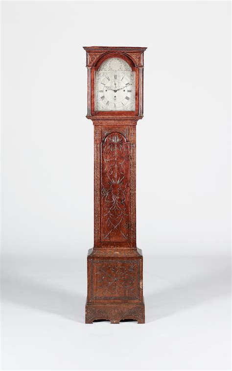 Bonhams A Late 18th Century Quarter Chiming Carved Oak Longcase Clock