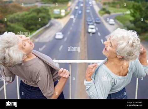 Never Too Old To Be Young At Heart Two Senior Women Flashing Their