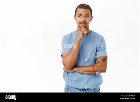 Portrait Of Man Thinking Looking Complicated Or Puzzled While