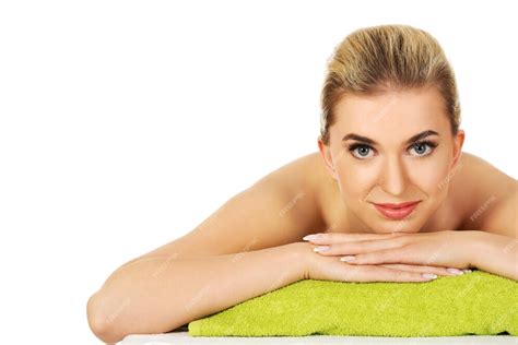 Premium Photo Portrait Of Shirtless Woman Lying On Massage Table