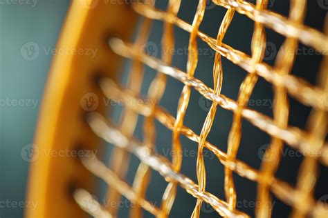 Intricate Badminton Racquet String Pattern Highlighting Design And Tension For Sports