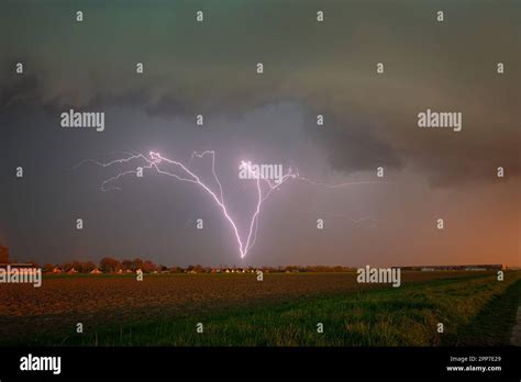 Upward Lightning Bolt Initiated By A Windturbine Along Highway A In