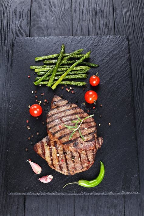 Beef Steaks Served With Grilled Asparagus Stock Photo Image Of