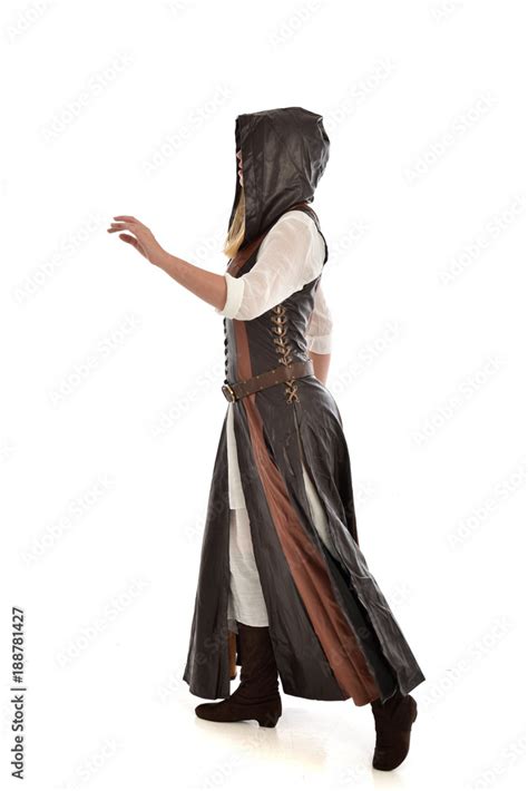 Full Length Portrait Of Girl Wearing Brown Fantasy Costume Standing