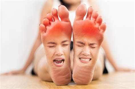Premium Photo A Womans Feet Are Shown With A Red Mark On Them
