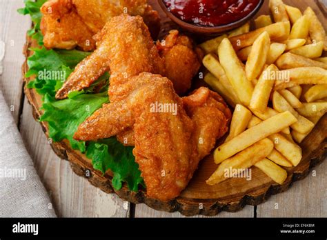 Fried Chicken Wings With Sauce And French Fries Stock Photo 78208248