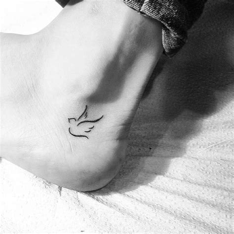 Minimalistic Style Dove Tattoo Located On The Ankle