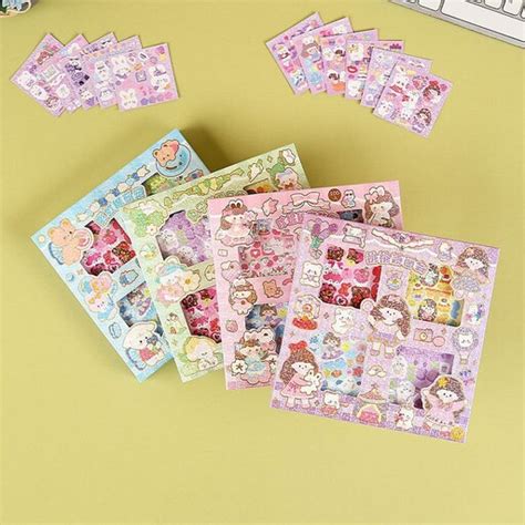 خرید و قیمت پک صد ورقی استیکر فانتزی در طرح های مختلف فانتزی برچسب