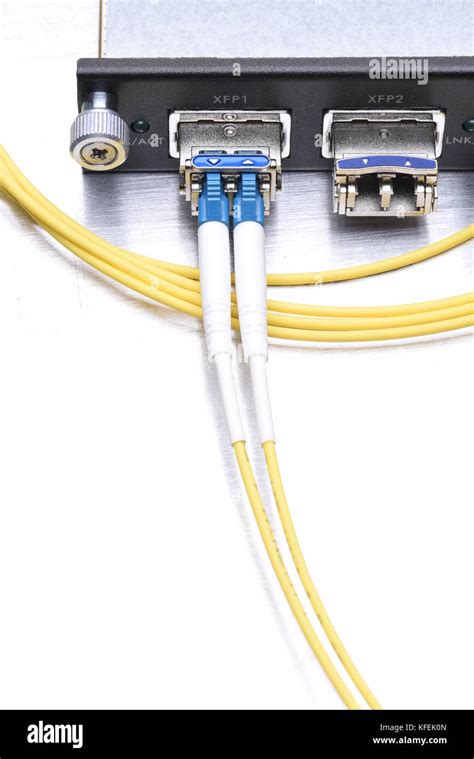 Gigabit Interface Converter With Optical Network Cables On Metal Grey