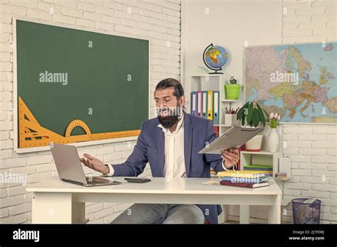 Widening Your Knowledge Informal Education Male Student Sit In School Classroom While Lesson