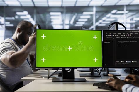 Server Farm Worker Uses Mockup Computer Display To Monitor Performance